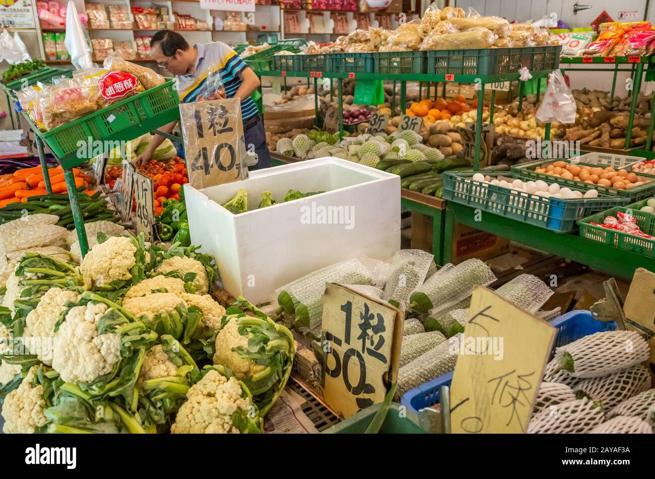 people shopping at traditional marketplace with vegetable and fruits at ...