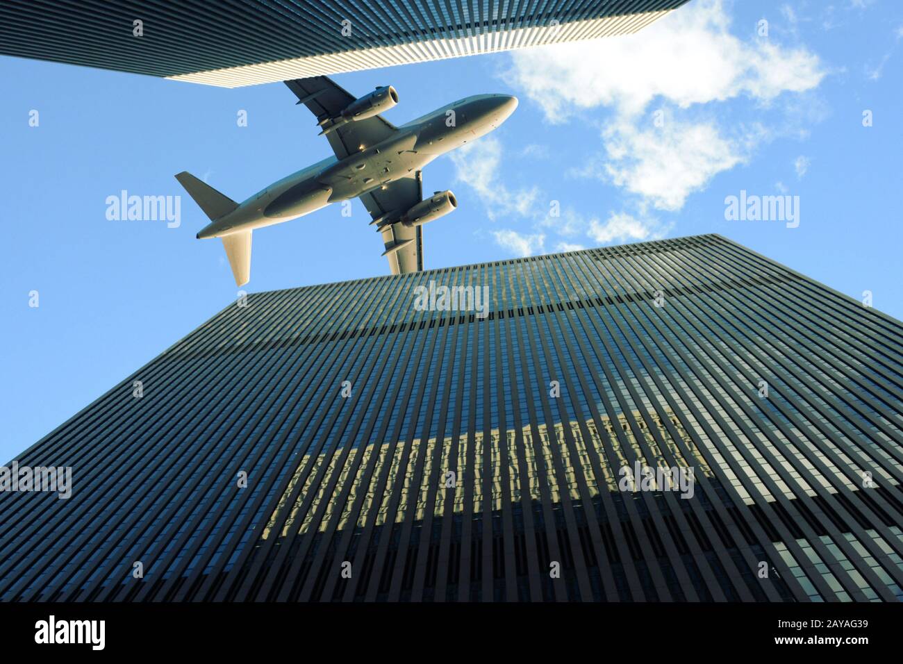 Airplane flying over high buildings hi-res stock photography and images ...