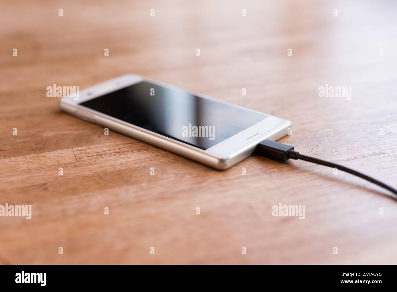 smart phone charging Stock Photo - Alamy