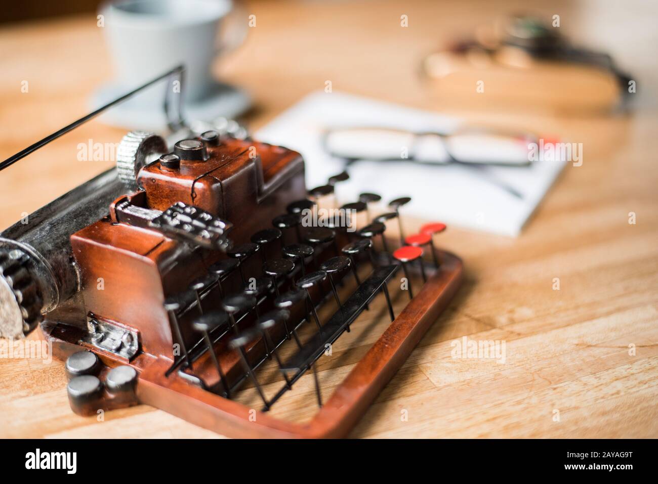 note book with typewriter Stock Photo - Alamy