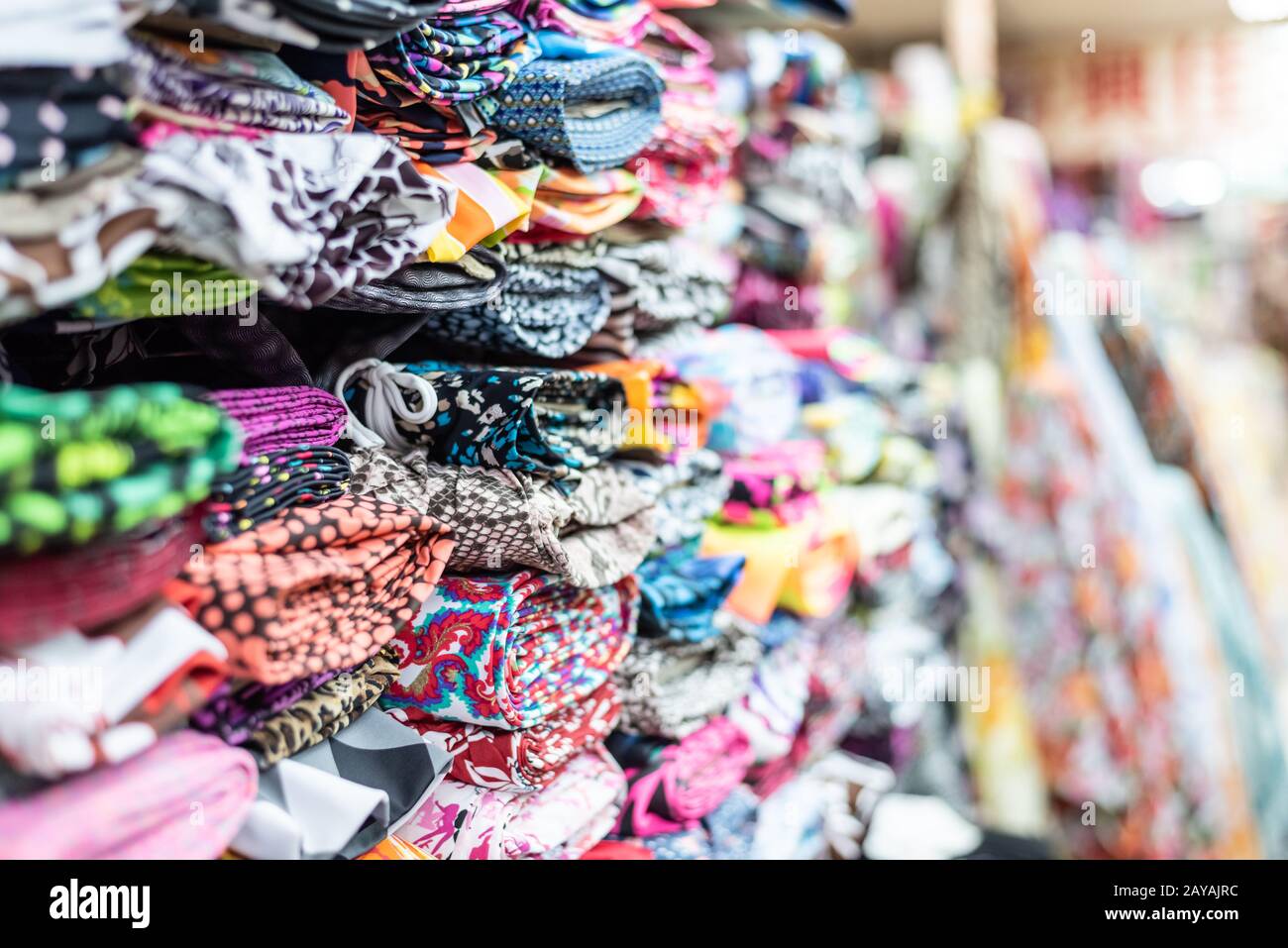 background of colorful fabric stacks Stock Photo - Alamy