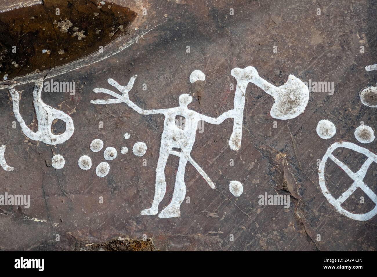 Rock carvings of the Axe god Stock Photo - Alamy