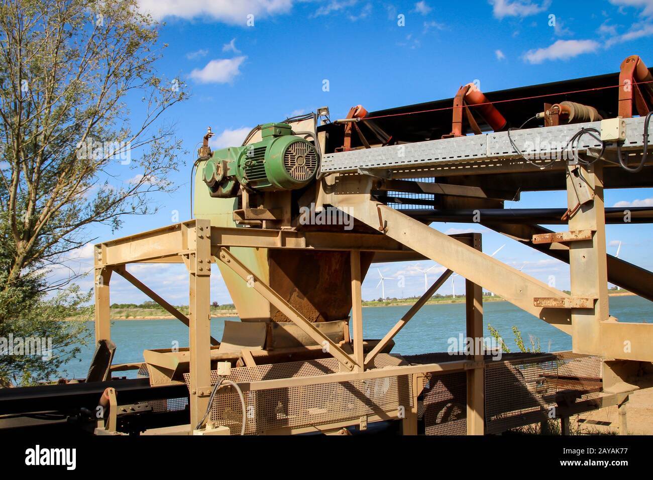 A string of transport belting in a gravel pit for transporting gravel ...