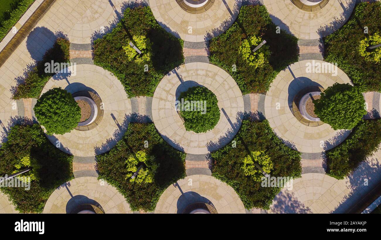 Vertical aerial top down view shot and looking down on the city park in ...