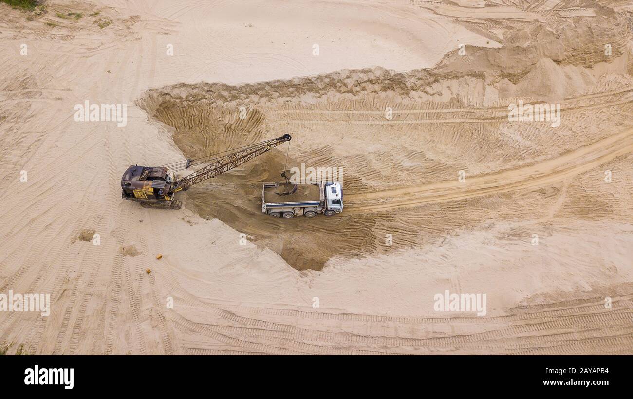 Top view of excavator working in construction site Stock Photo - Alamy