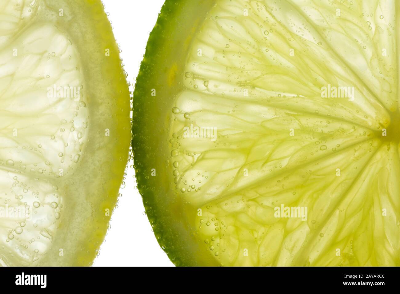 Fresh lime slices isolated on white background Stock Photo - Alamy
