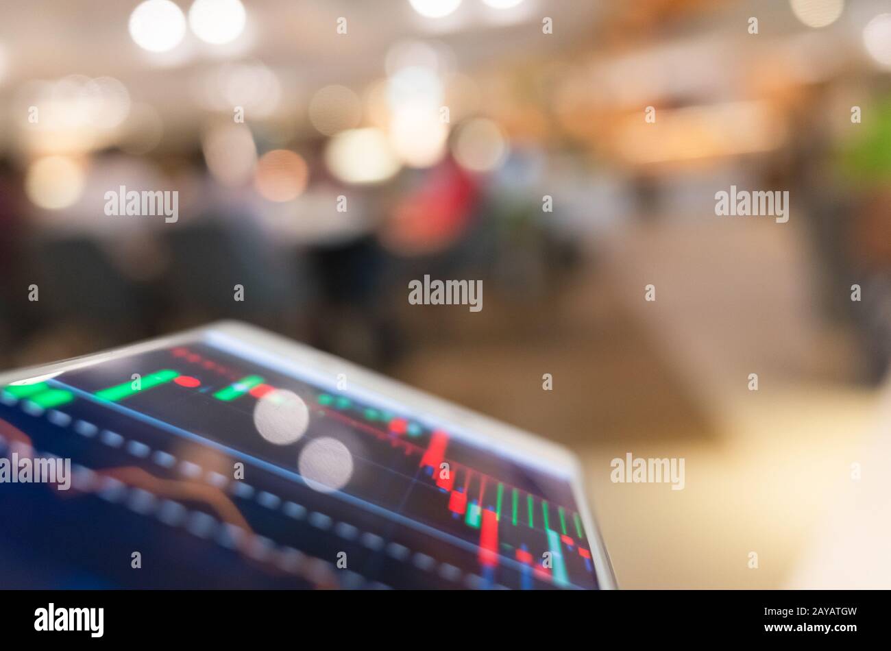 using a mobile device to check market data Stock Photo - Alamy