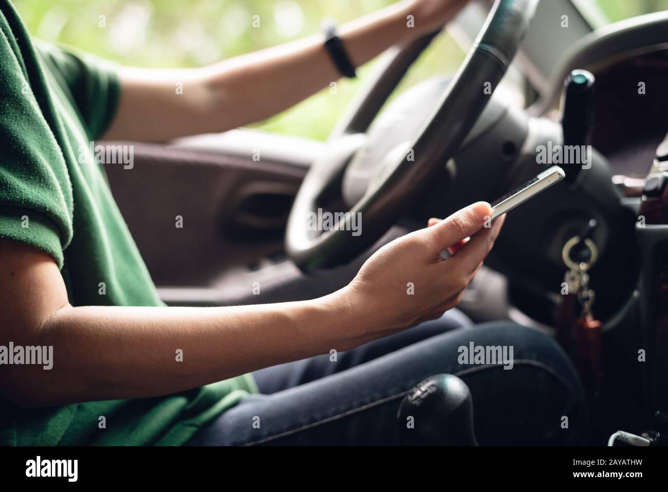 woman using smartphone in a car Stock Photo - Alamy