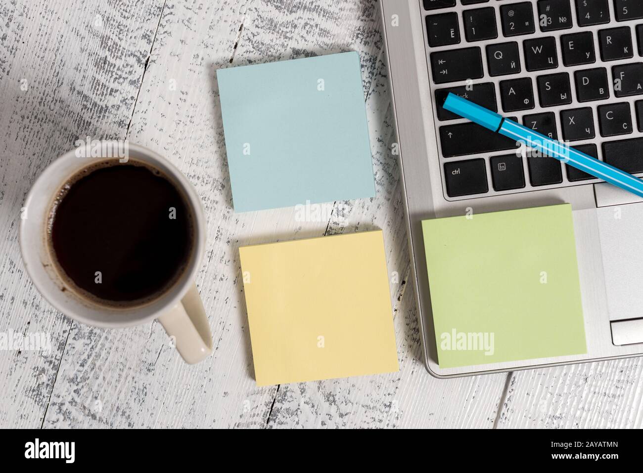 Trendy metallic laptop three sticky note pads pen ballpoint coffee cup ...