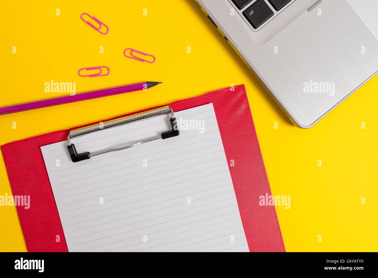 Front view open trendy metallic slim laptop colored clipboard blank ...