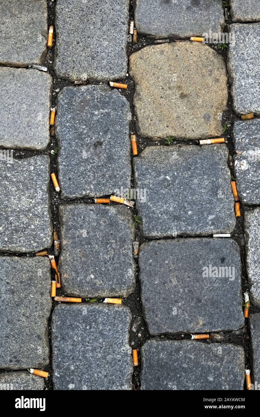 Cigarette butts, cigarette ends Stock Photo - Alamy