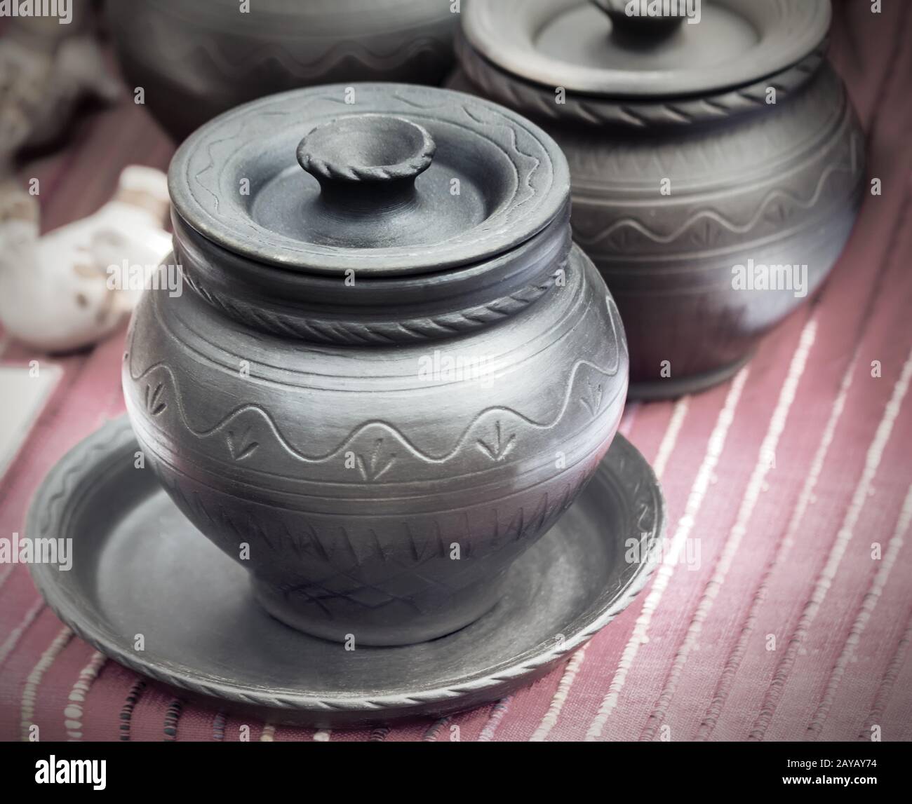 Handmade ceramic tableware is sold at the fair Stock Photo - Alamy