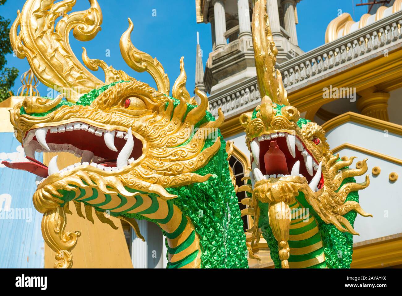 Statues of green dragons at temple in Thailand Stock Photo - Alamy