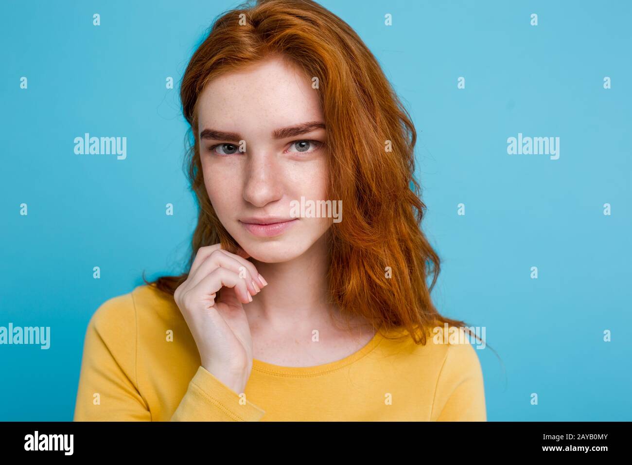 Headshot Portrait of happy ginger red hair girl with freckles smiling ...