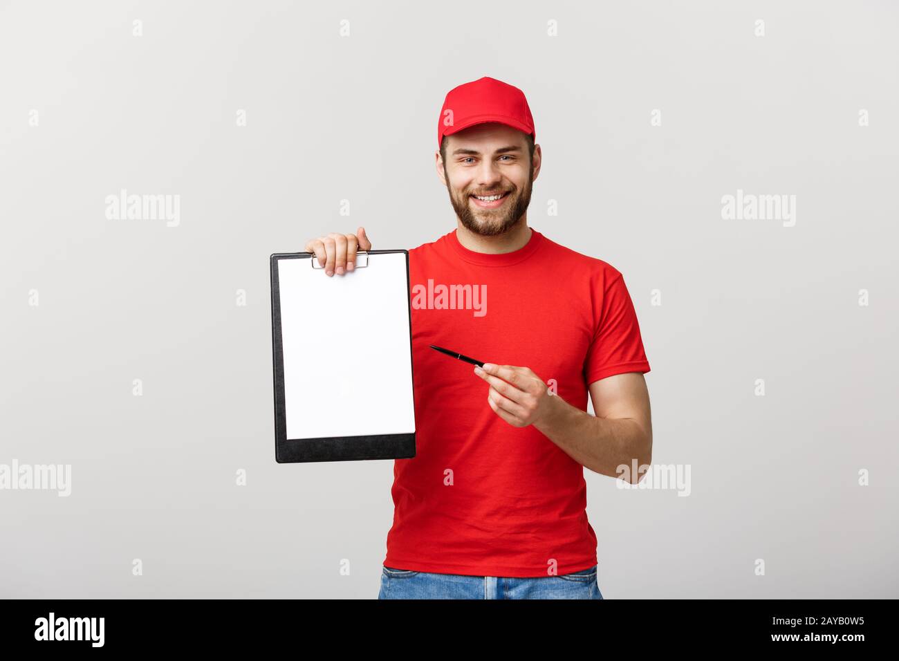 Delivery Concept: Portrait Young caucasian Handsome delivery man or ...