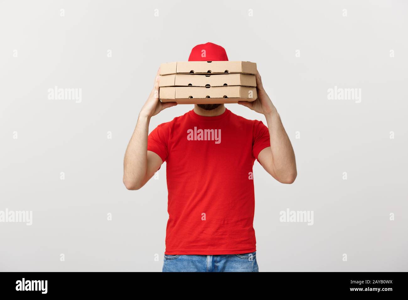 Man carrying stack pizza boxes hi-res stock photography and images - Alamy