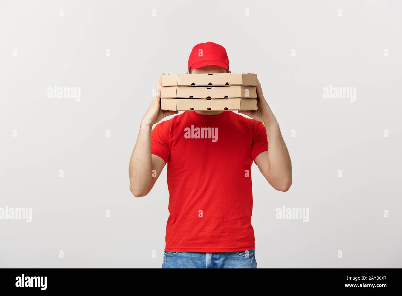 Man carrying stack pizza boxes hi-res stock photography and images - Alamy
