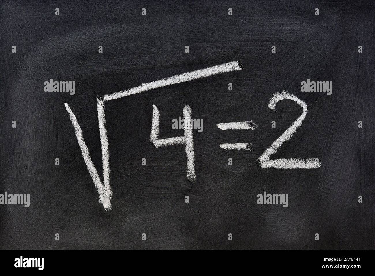 Square root of four equal to two, handwritten on the blackboard with a ...