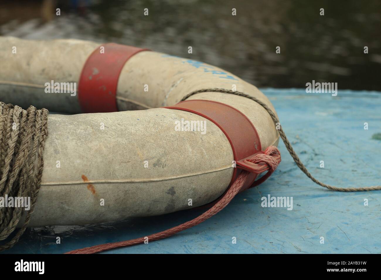 lifebelt on the old boat Stock Photo - Alamy