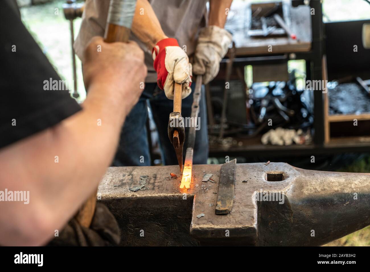 Blacksmith in the Field forge Stock Photo - Alamy