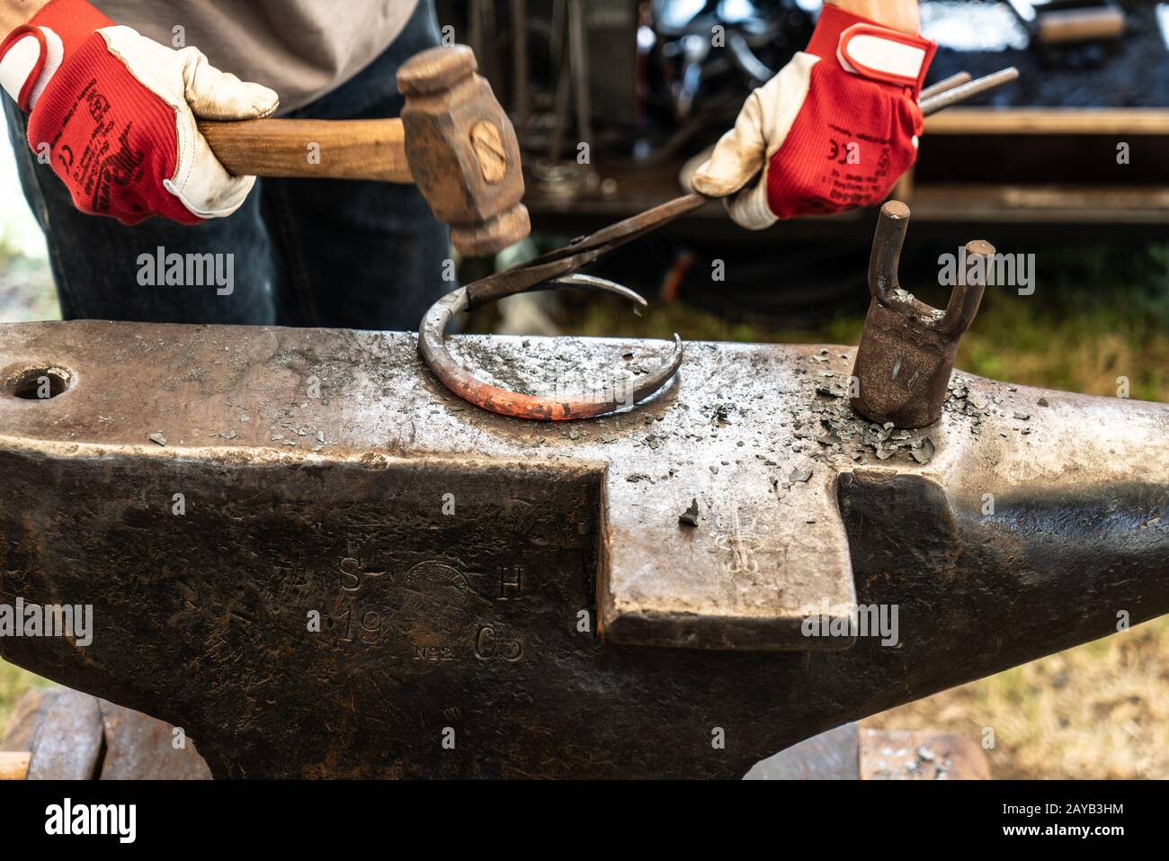 Blacksmith in the Field forge Stock Photo - Alamy
