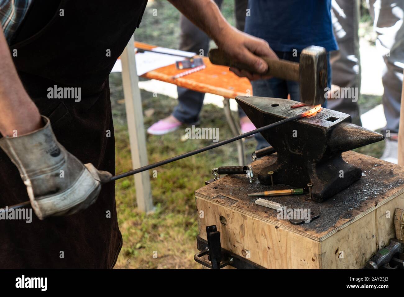 Blacksmith in the Field forge Stock Photo - Alamy