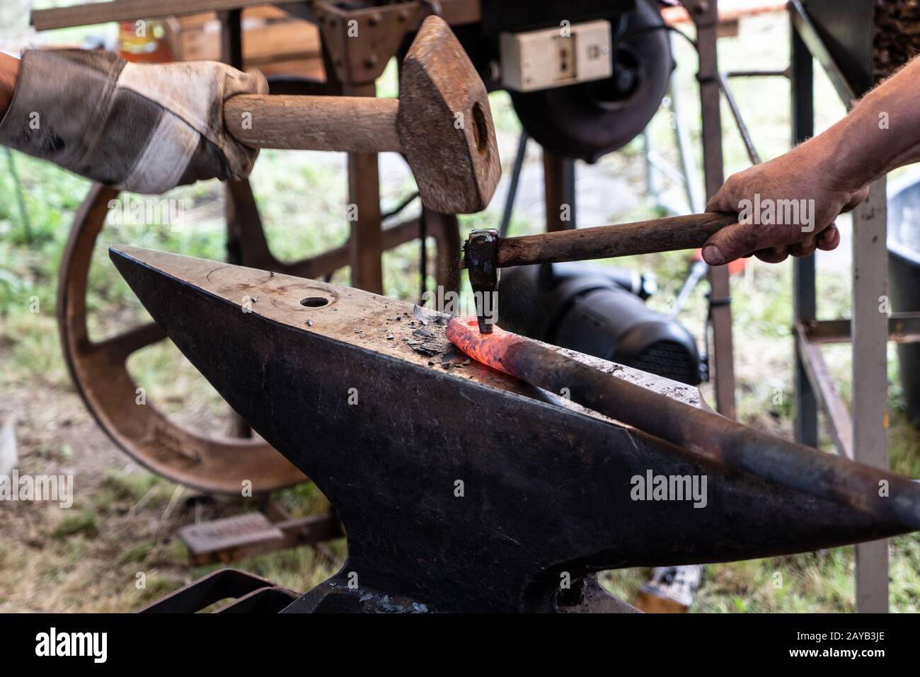 Blacksmith in the Field forge Stock Photo - Alamy
