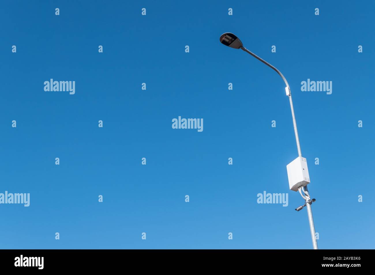 Street lamp with CCTV camera Stock Photo - Alamy