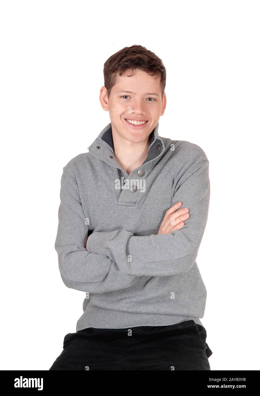 Teenager boy sitting on chair hi-res stock photography and images - Alamy