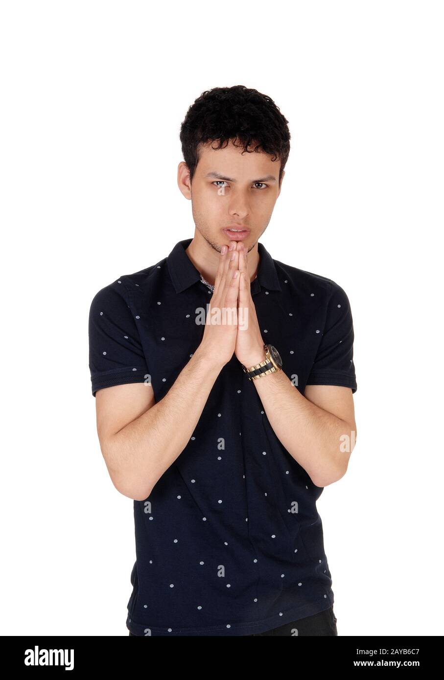 Man praying folded hands hi-res stock photography and images - Alamy