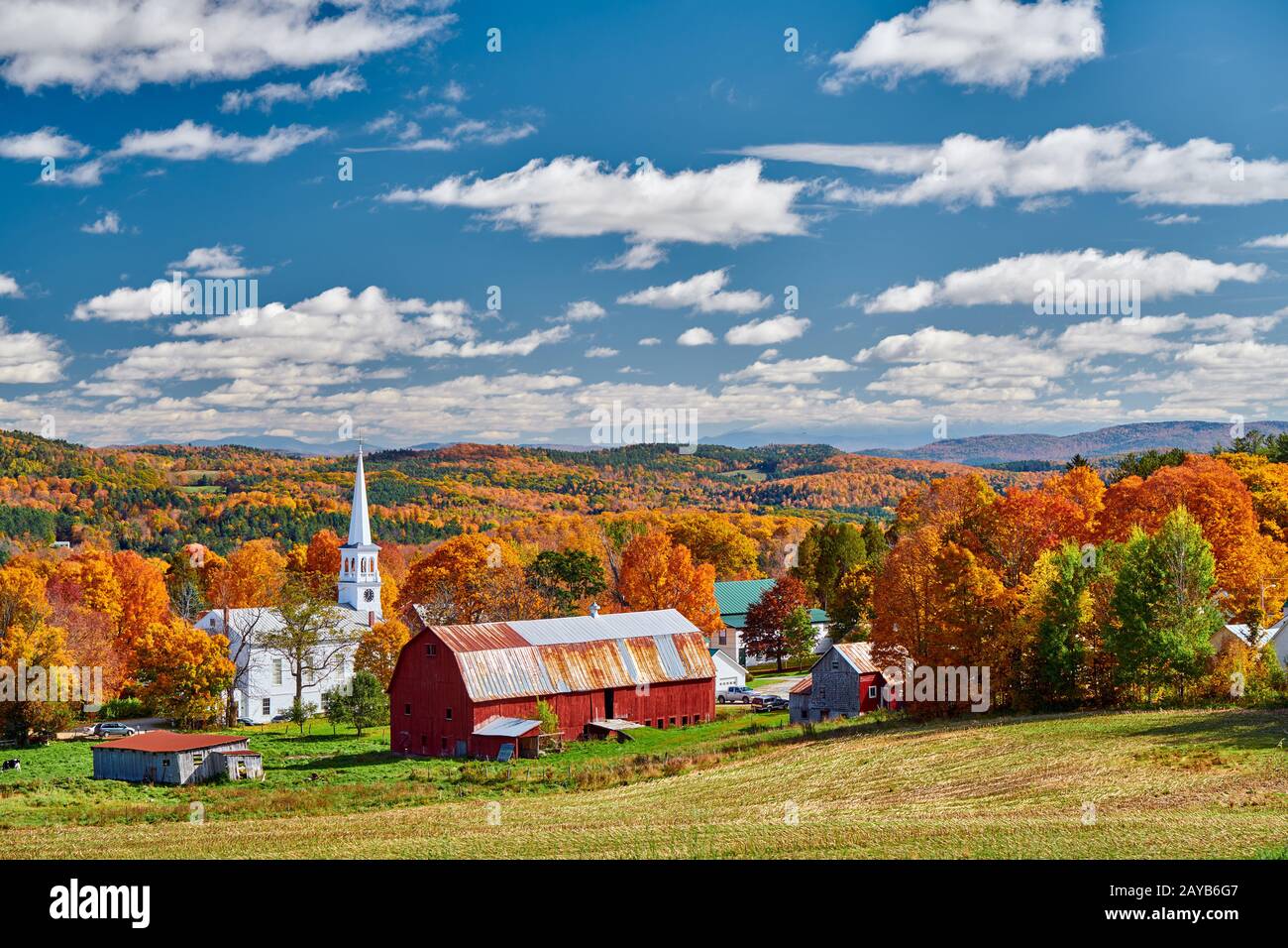 Church and farm with red barn at autumn Stock Photo - Alamy