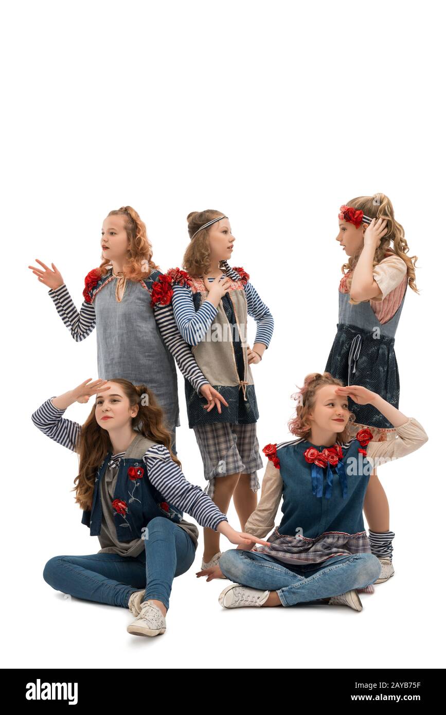Pretty girls in original costumes group portrait Stock Photo - Alamy