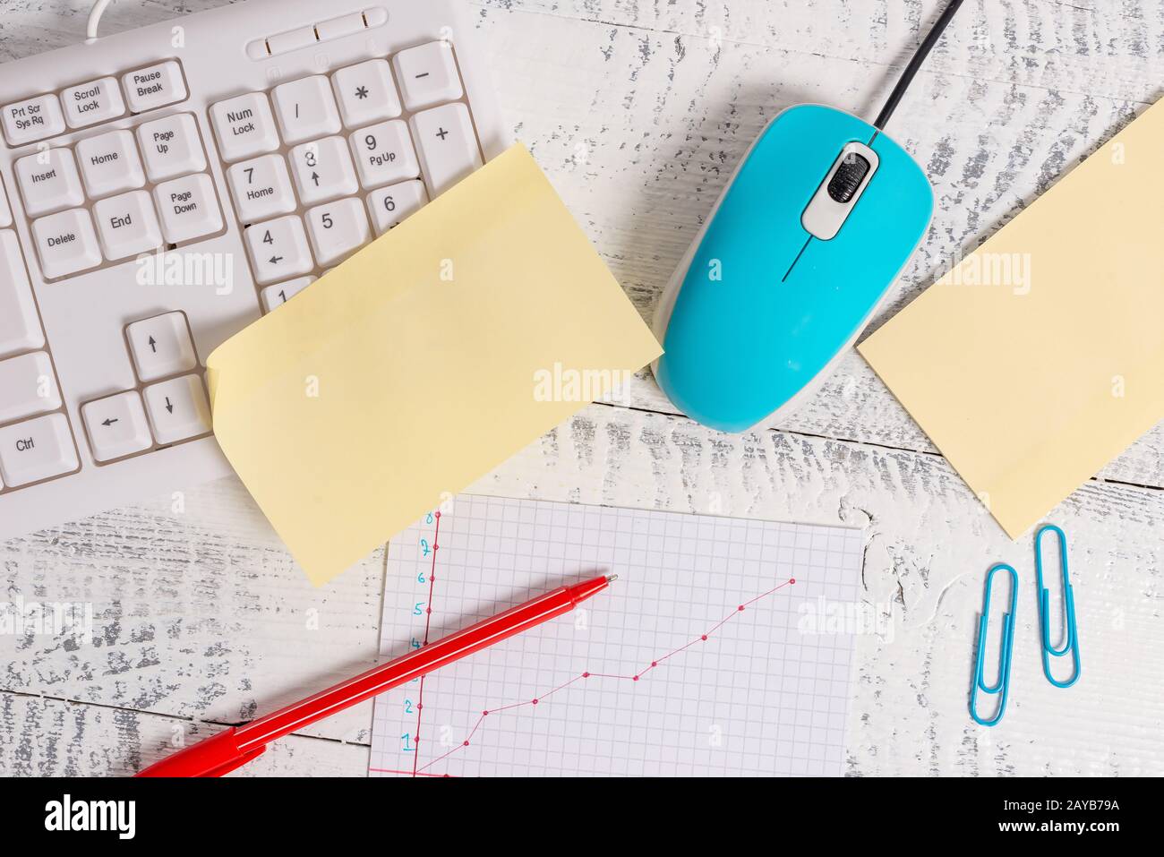 Writing equipments and computer tools plus graphic picture placed on a ...