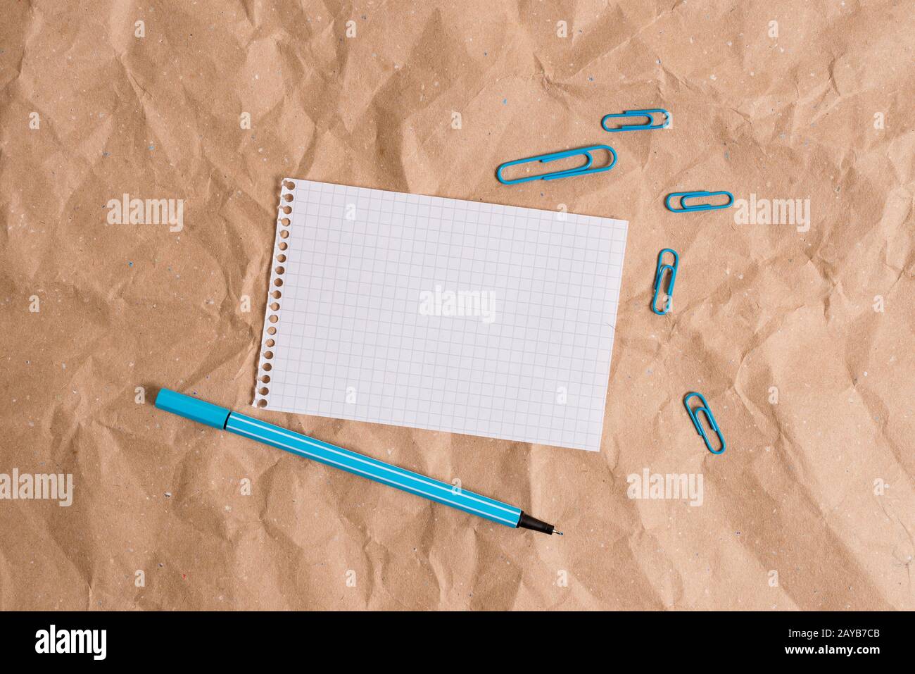 Desk made of crumpled cardboard with different types and sizes of empty ...