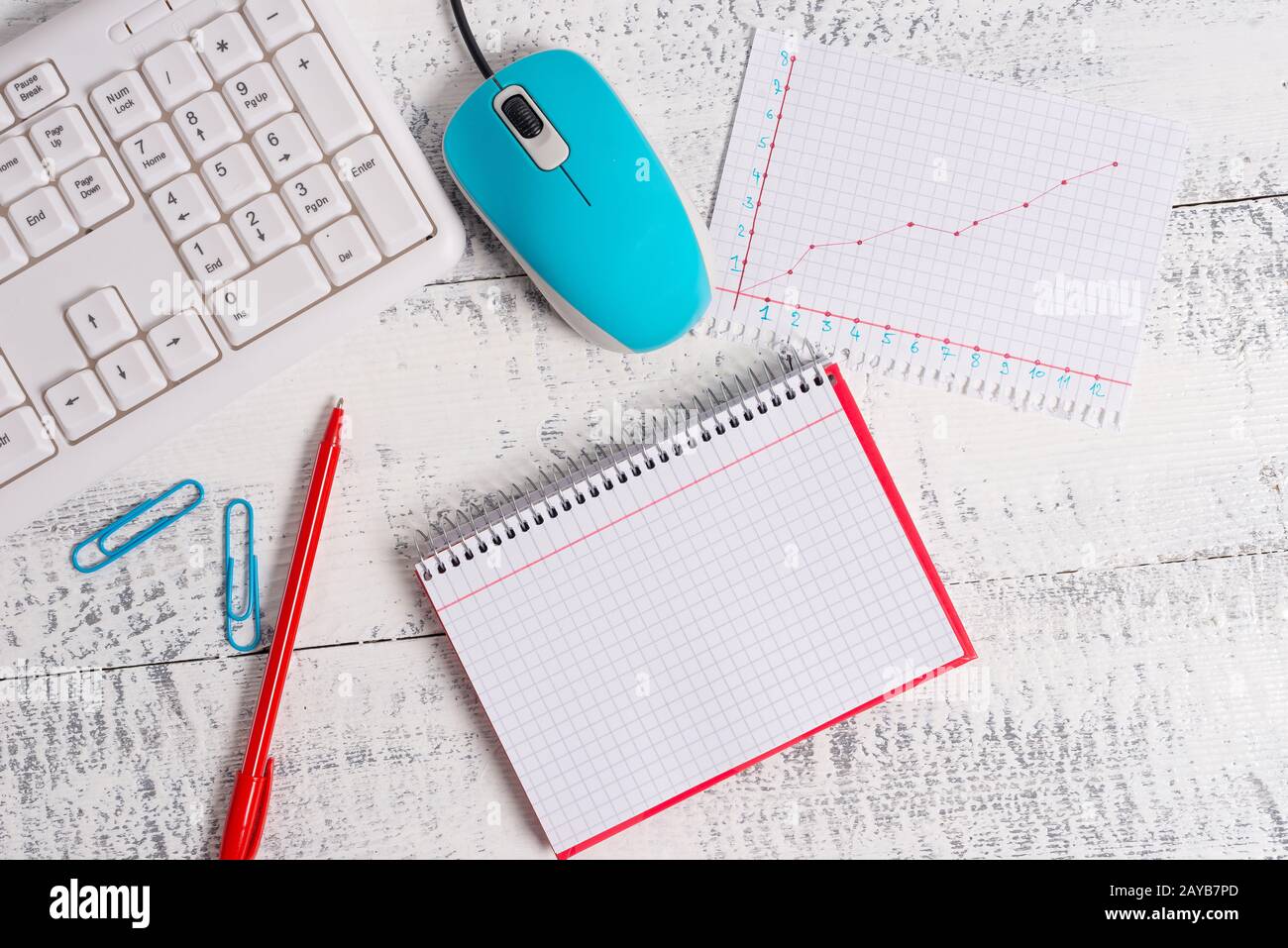 White old wooden desk with office appliances, computer equipments and a ...