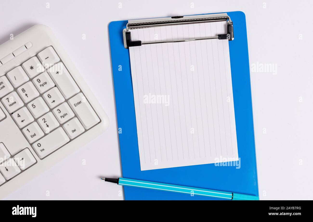 Blue notepaper with blank paper for text message. Flat lay above table ...