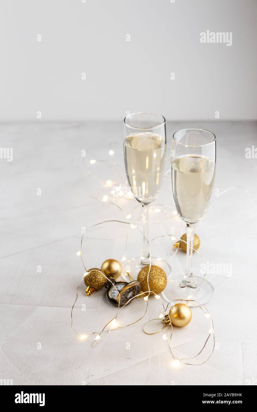 Pocket watch and champagne glasses Stock Photo - Alamy