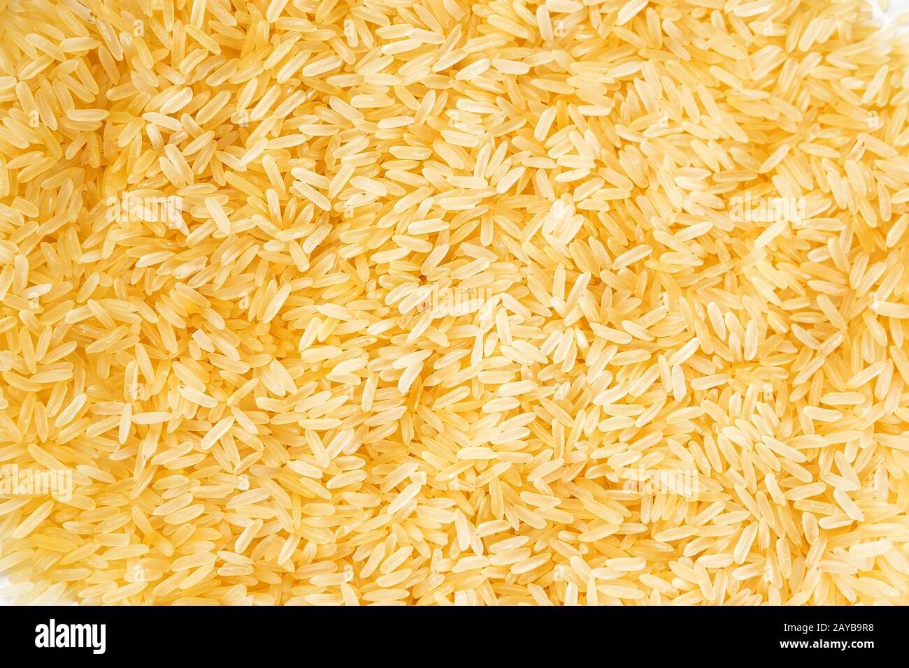 Organic rice on white background Stock Photo - Alamy