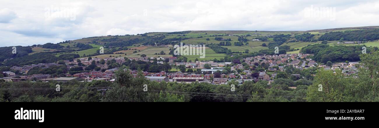 a long panoramic view of the town of mytholmroyd from above with ...