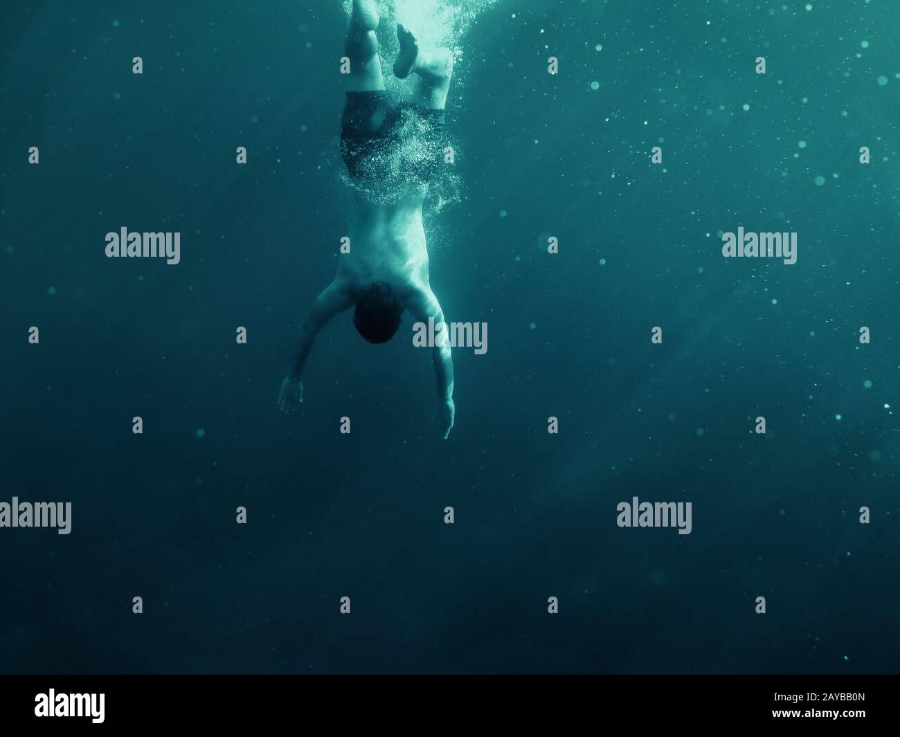 Person Sinking In Water