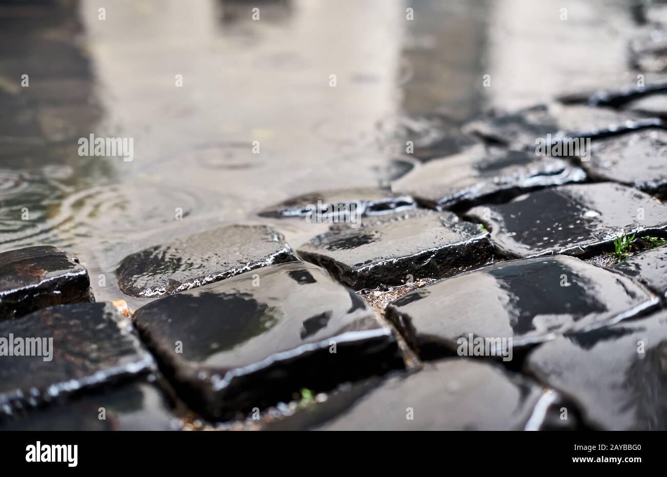 Cobblestone brick paved street in Rome Stock Photo - Alamy