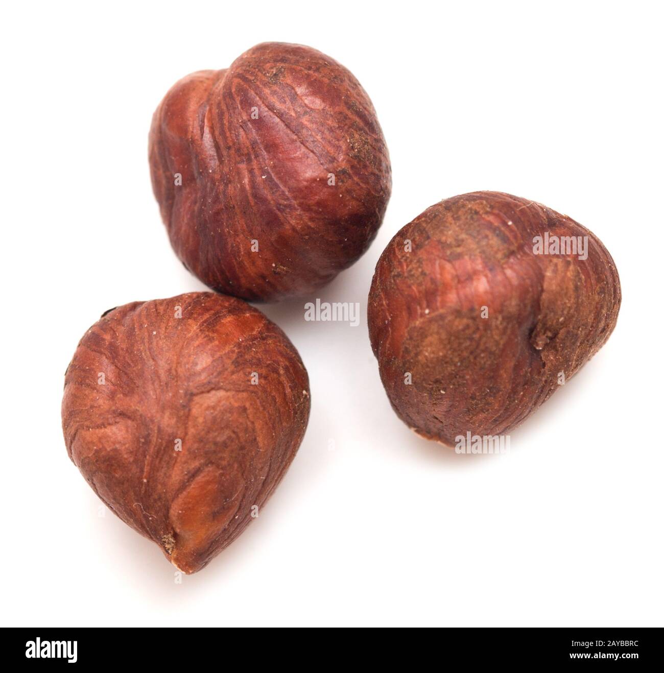 Hazelnuts on white Stock Photo - Alamy