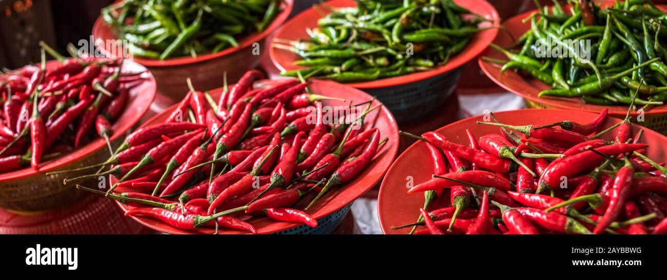 Colorful chilli peppers stall at asian market Stock Photo - Alamy