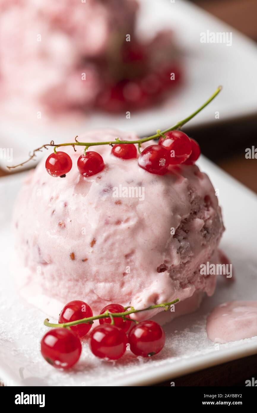 Close up of currant ice cream on plates Stock Photo - Alamy