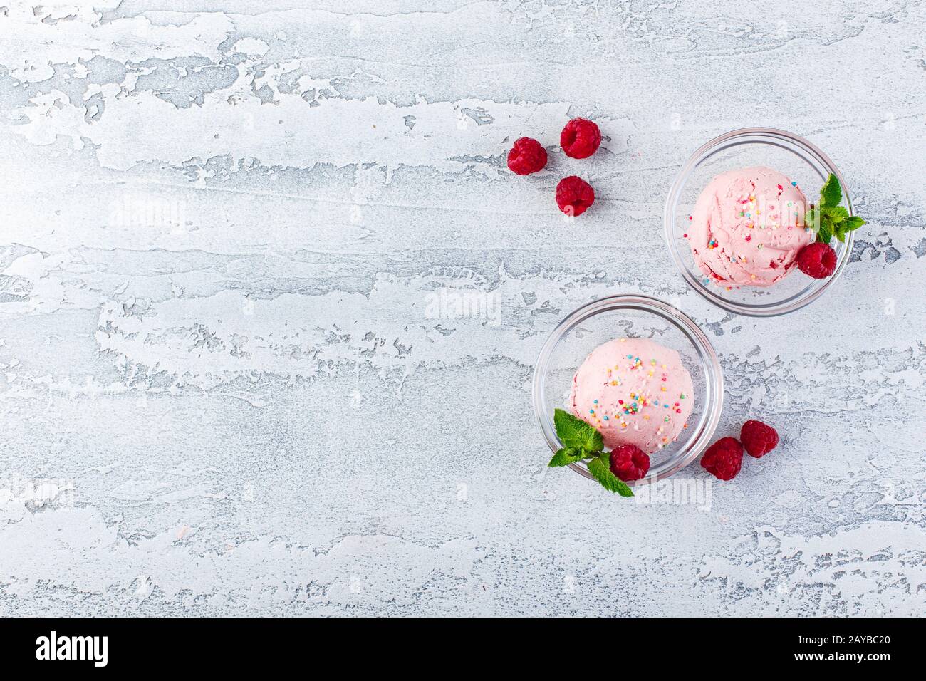 Raspberry ice cream in bowl Stock Photo - Alamy