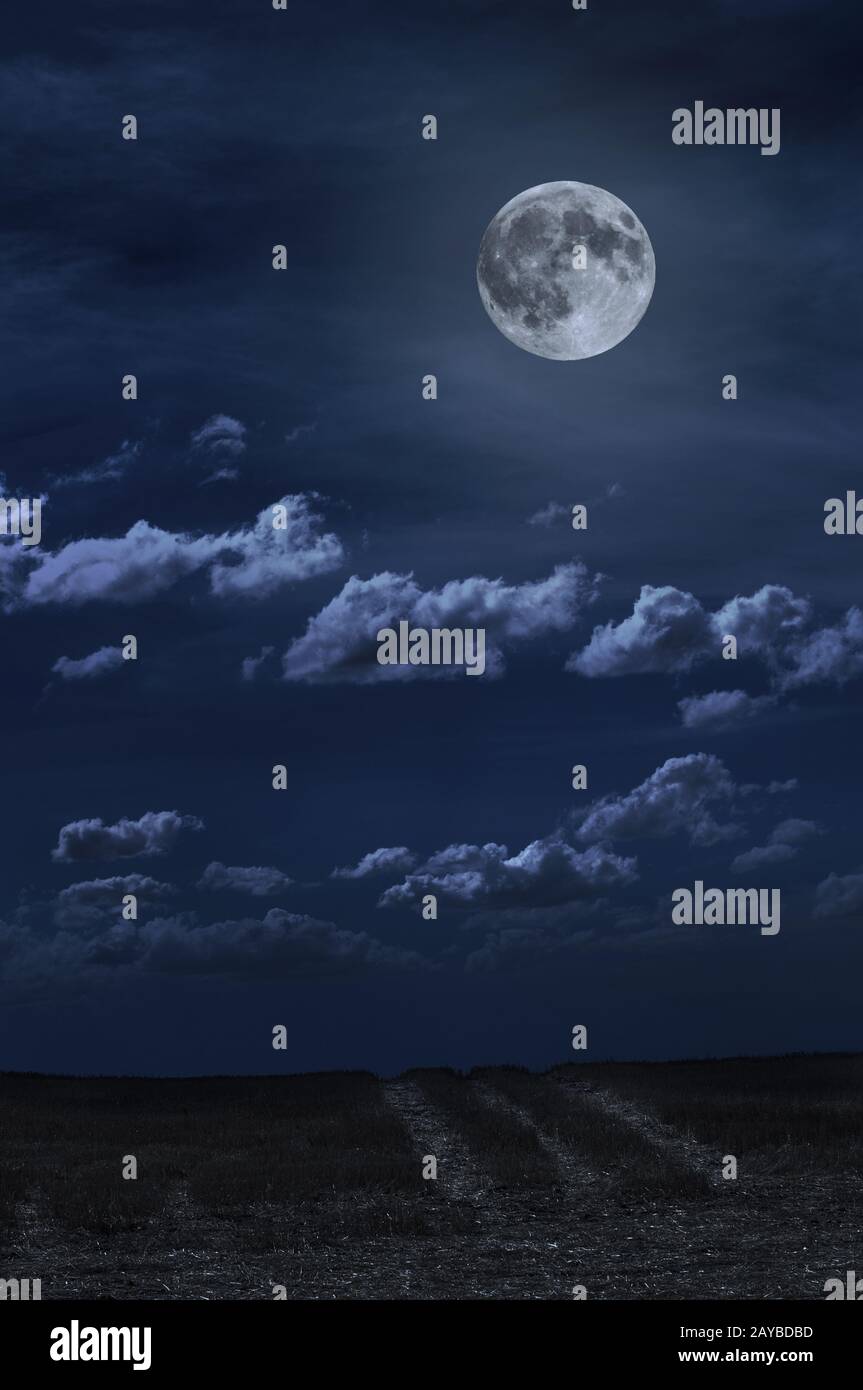 Moon and clouds in the night. Moonlight and road background Stock Photo ...