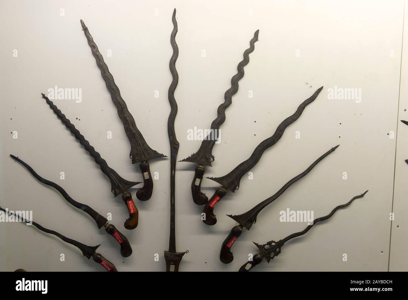 A collection of Kris knifes or swords at the Radya Pustaka Museum is a ...