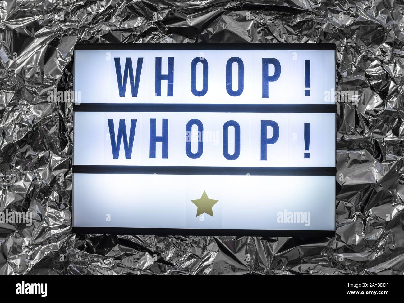 Text Whoop on white illuminated board. Conceptual message for ...