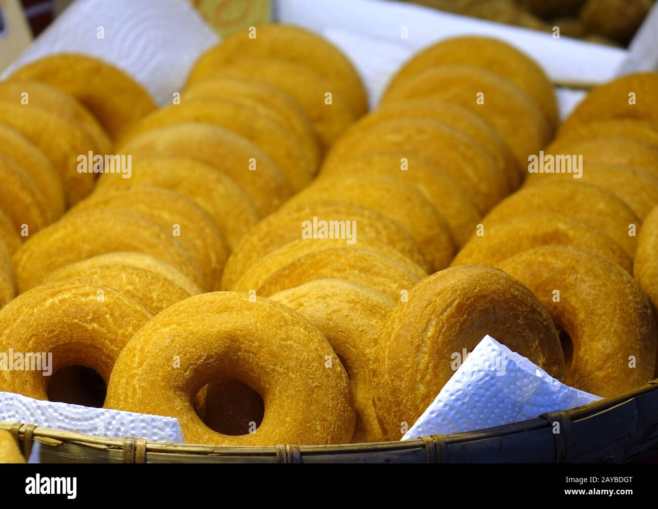Stacks of fresh donuts are sold at an outdoor market Stock Photo - Alamy