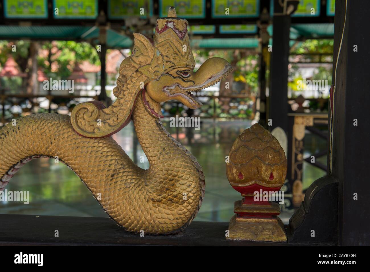 Detail of a naga statue on a fence of one of the pavilions at the ...